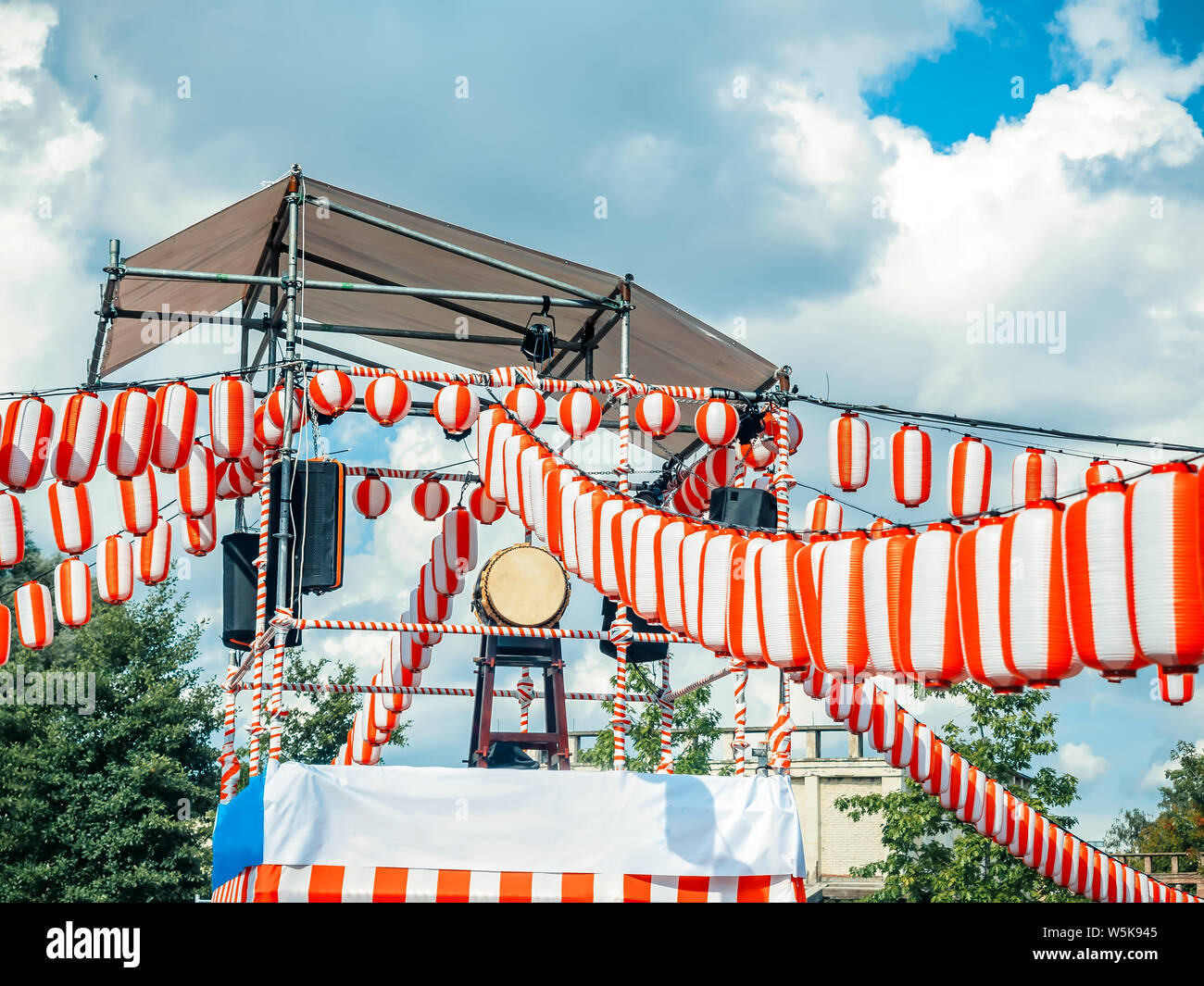 The stage of the Yagura with a big japanese taiko drum Odaiko. Paper ...