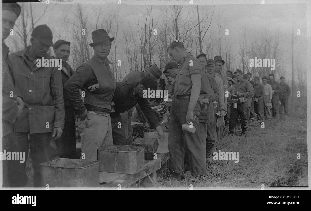 CCC workers line up for food. Mud Lake NWR, Minnesota Stock Photo - Alamy