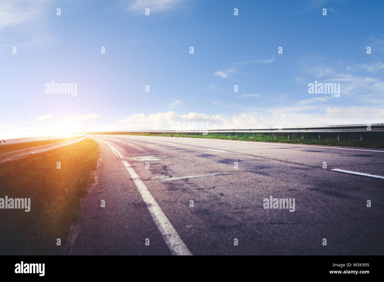 Panoramic road sunrise summer travel Stock Photo - Alamy
