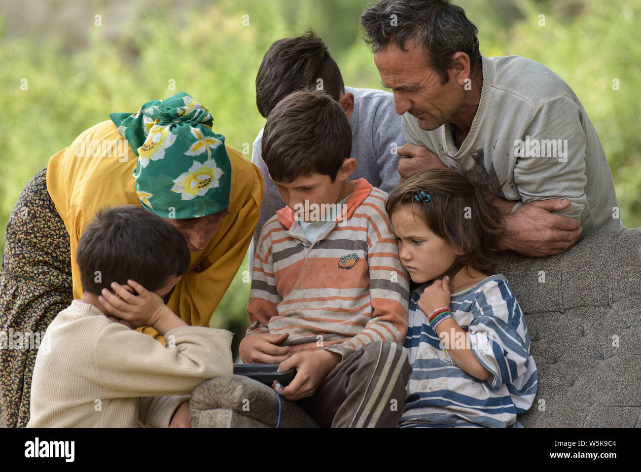 HONEYLAND, Hatidze Muratova (with headscarf), 2019. ph: Ljubomir ...