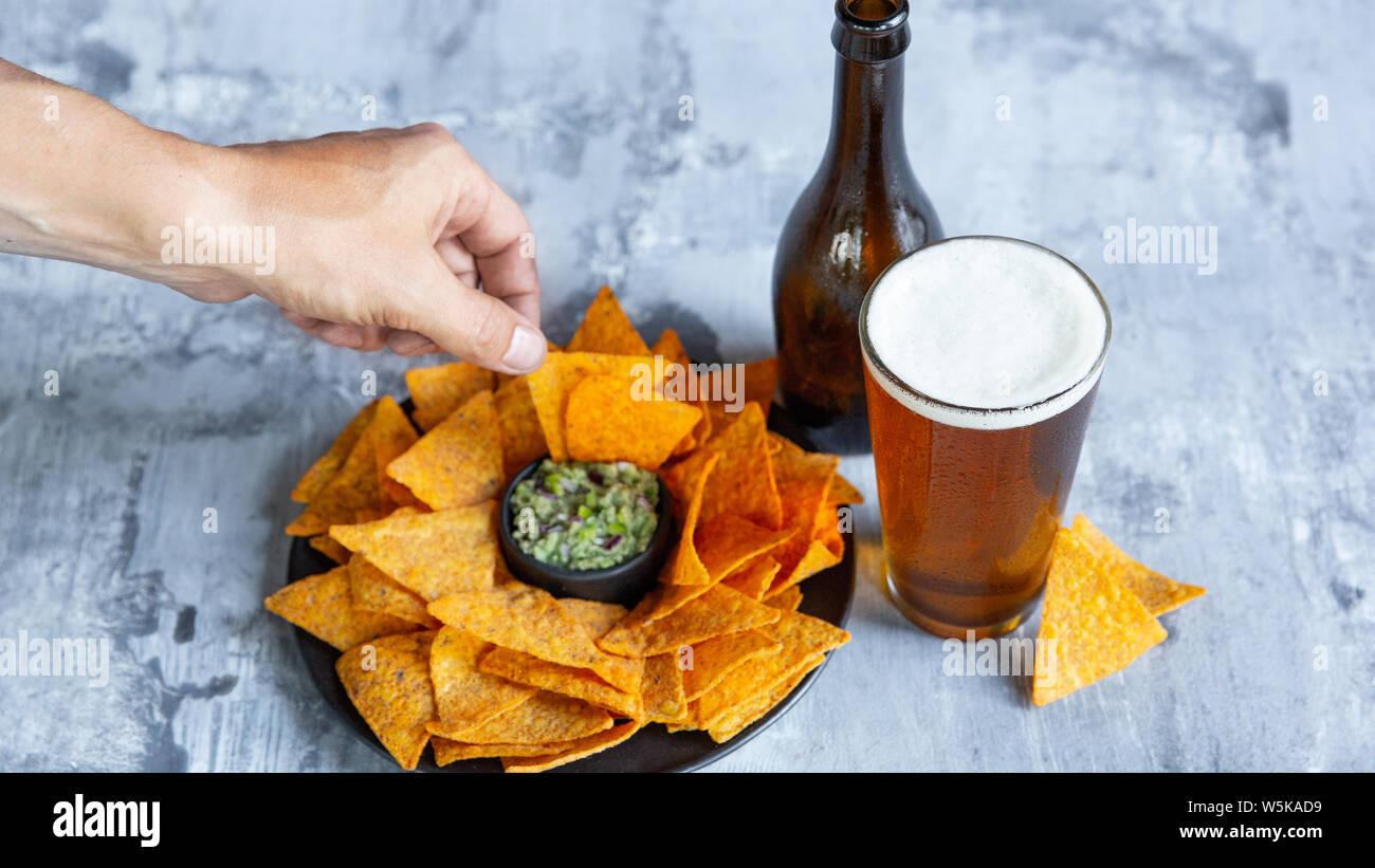 Glass of light beer on white stone background. Cold alcohol drink and ...