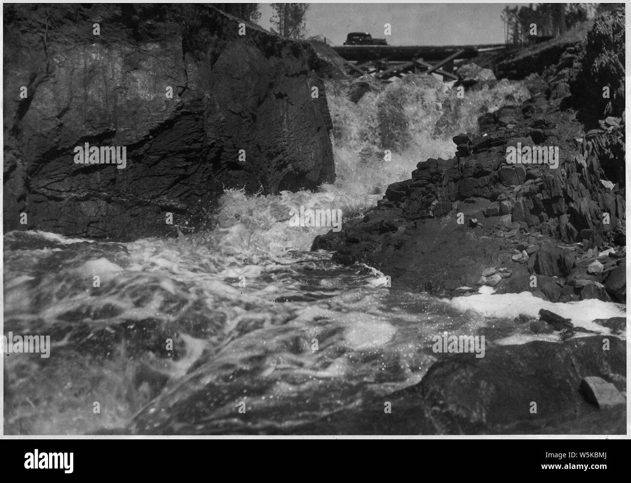 Bridge over waterfall Black and White Stock Photos & Images - Alamy
