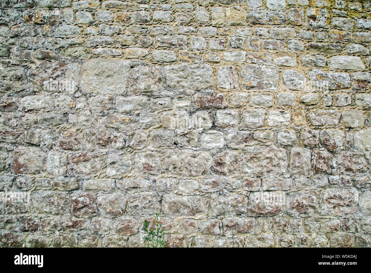 Ancient stone wall texture background Stock Photo - Alamy