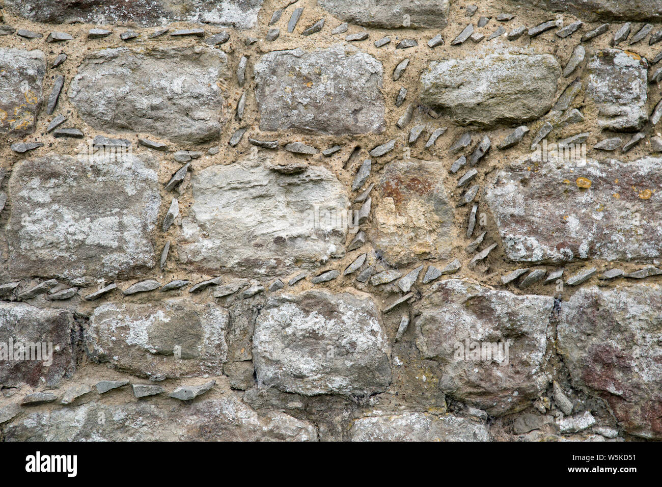 Ancient stone wall texture background Stock Photo - Alamy