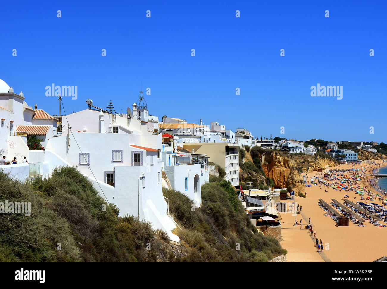 The old town of Albufeira overlooking the golden sandy beaches Stock ...