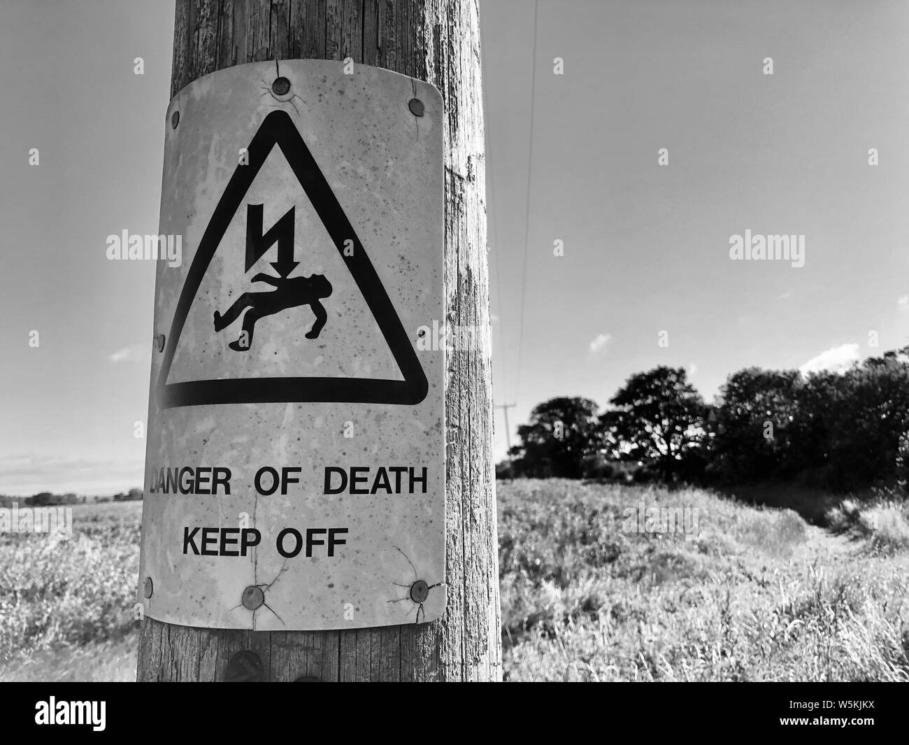Danger Warning sign. Danger of death by electrocution. Power cables in ...