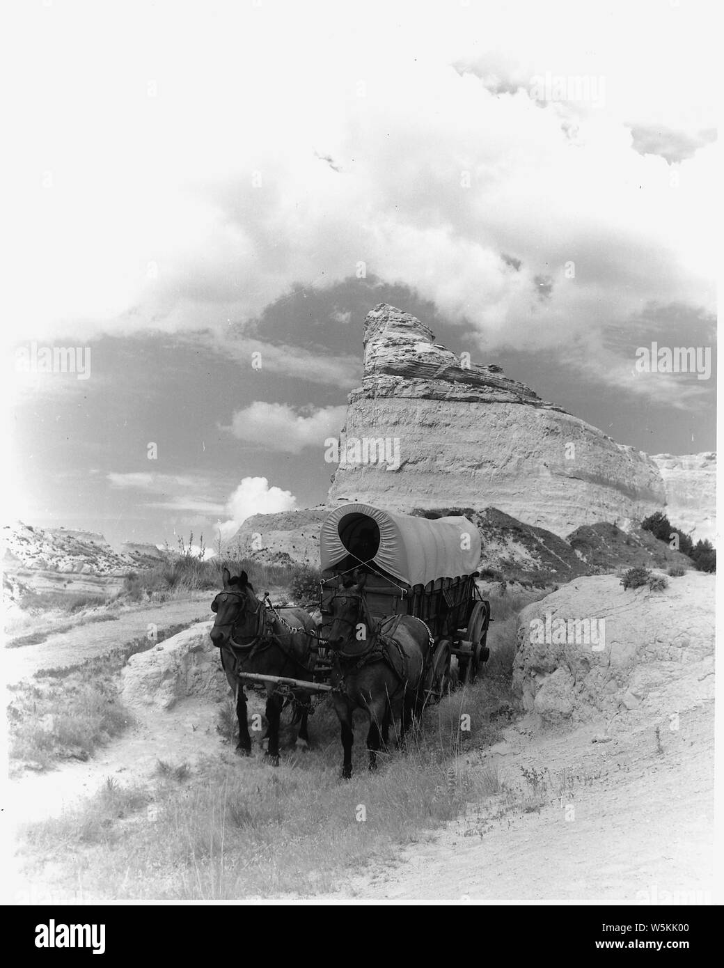 Conestoga wagon on Oregon Trail; Scope and content: Rock formation in ...