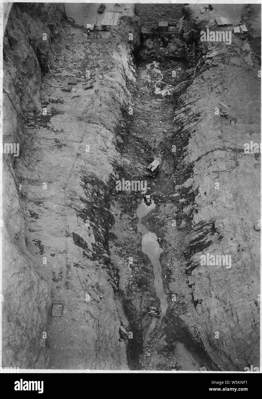 Dam foundation excavation as seen from cableway skip at approximate ...