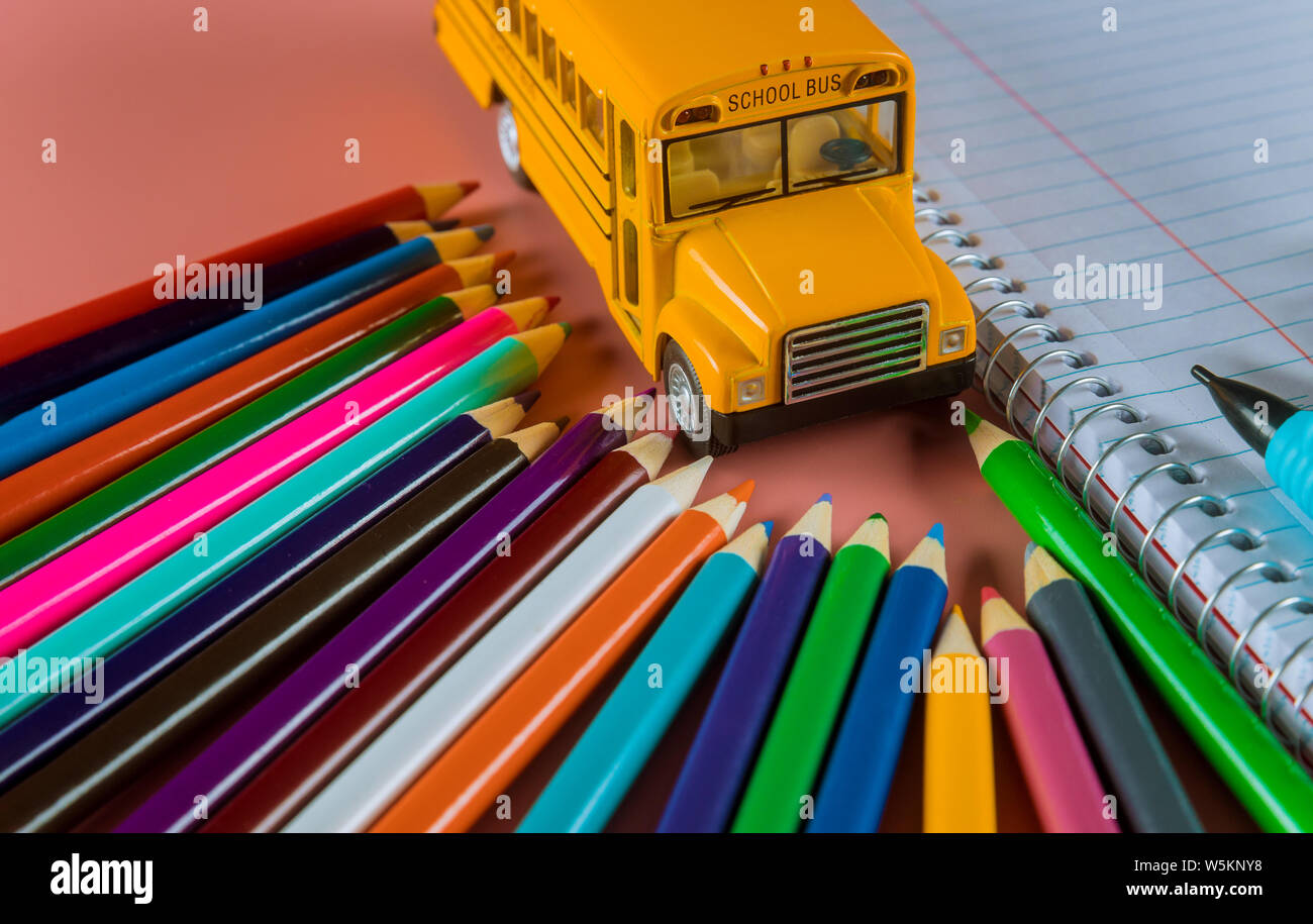 Back to school concept with bus and notebook ,colored pencils Stock ...