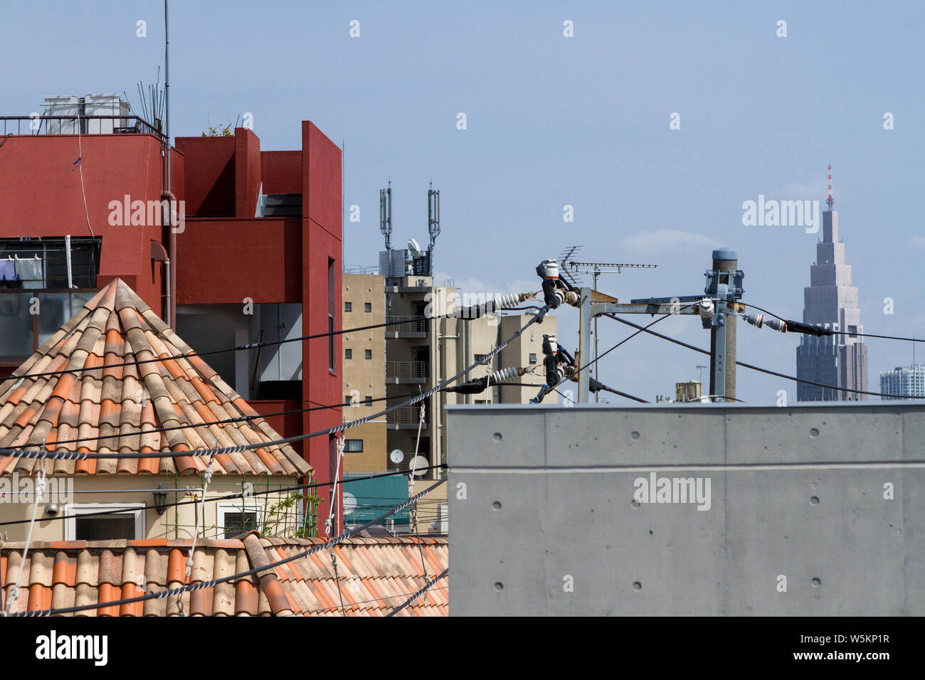 The tower of the NTT Docomo Yoyogi Building (right) seen above Tokyo ...