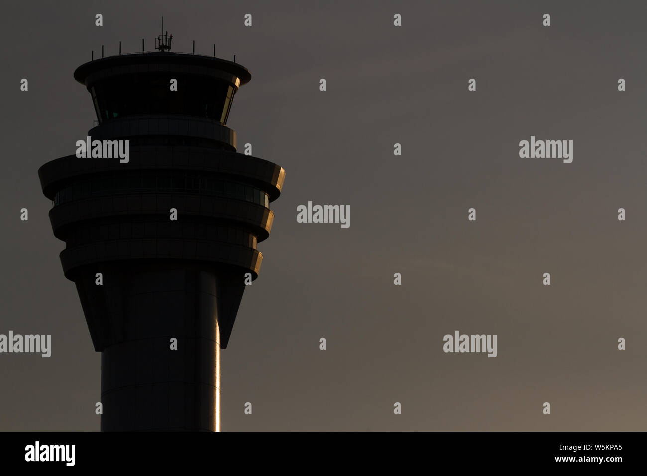 Shadowy, evening image of the air traffic control tower at Haneda ...