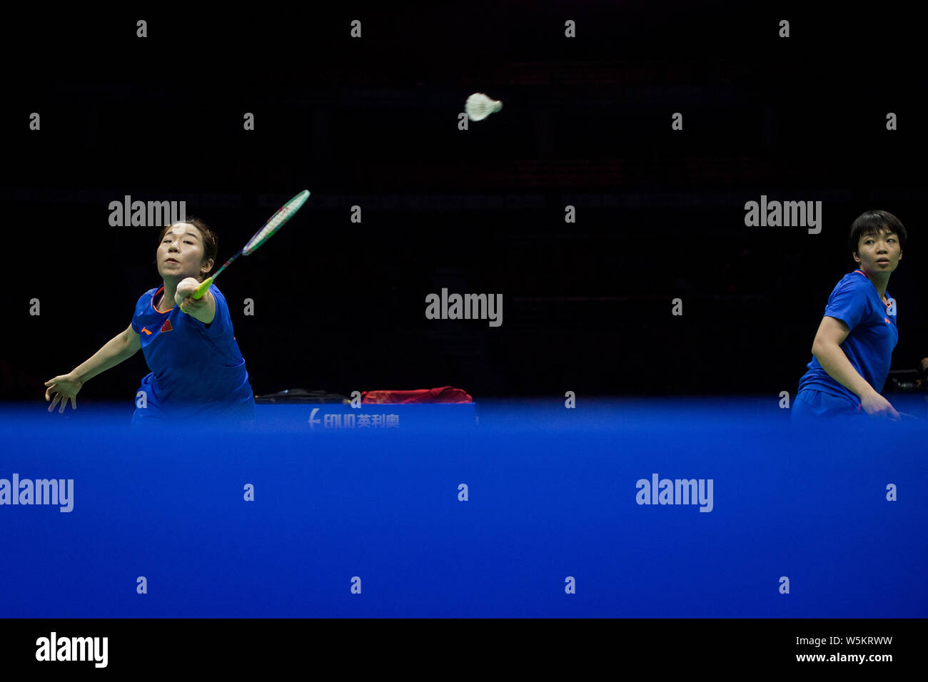 Chen Qingchen And Jia Yifan Of China Return A Shot To Mayu Matsumoto And Wakana Nagahara Of