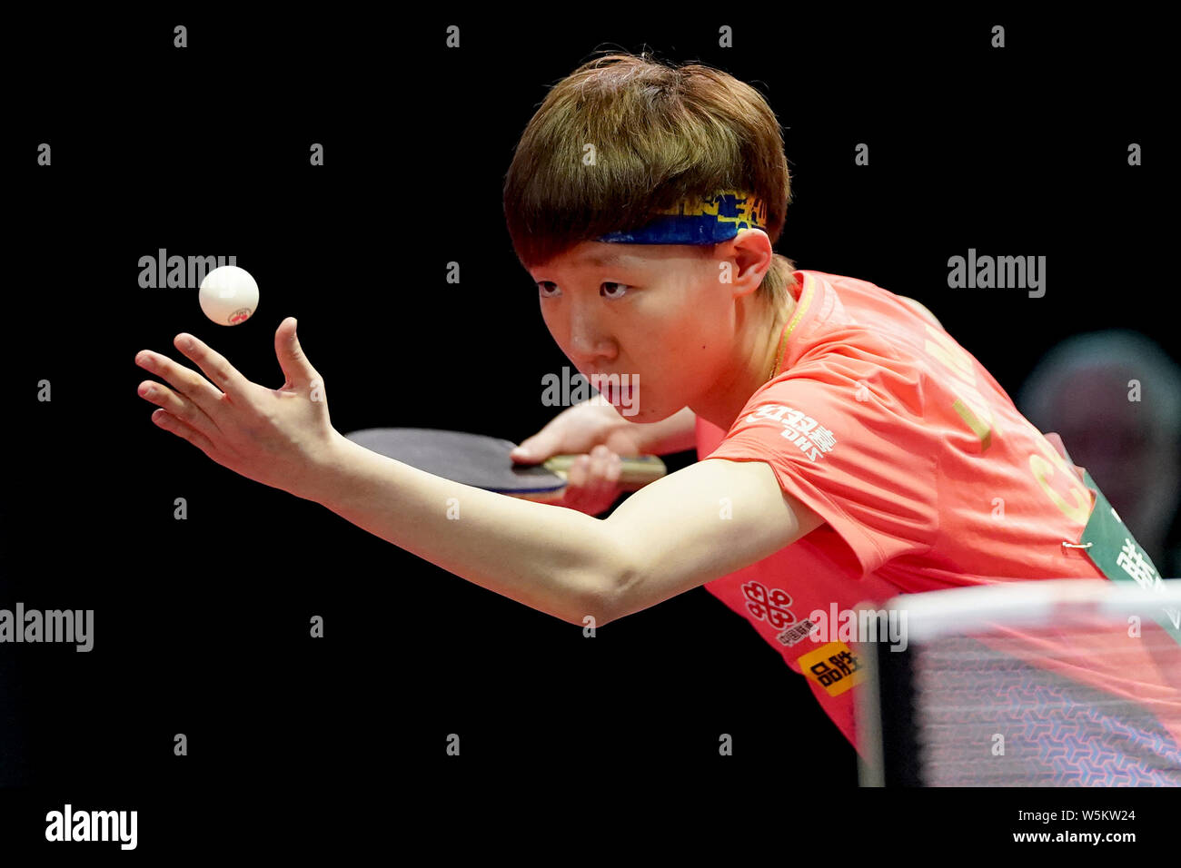 Wang Manyu of China serves against Elizabeta Samara of Thailand in ...