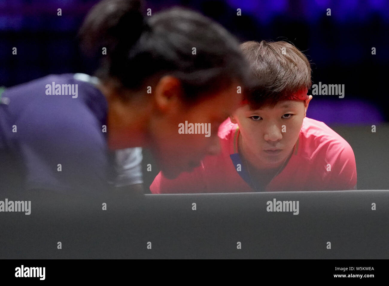 Wang Manyu of China reacts as she competes against Sarah Hanffou of ...