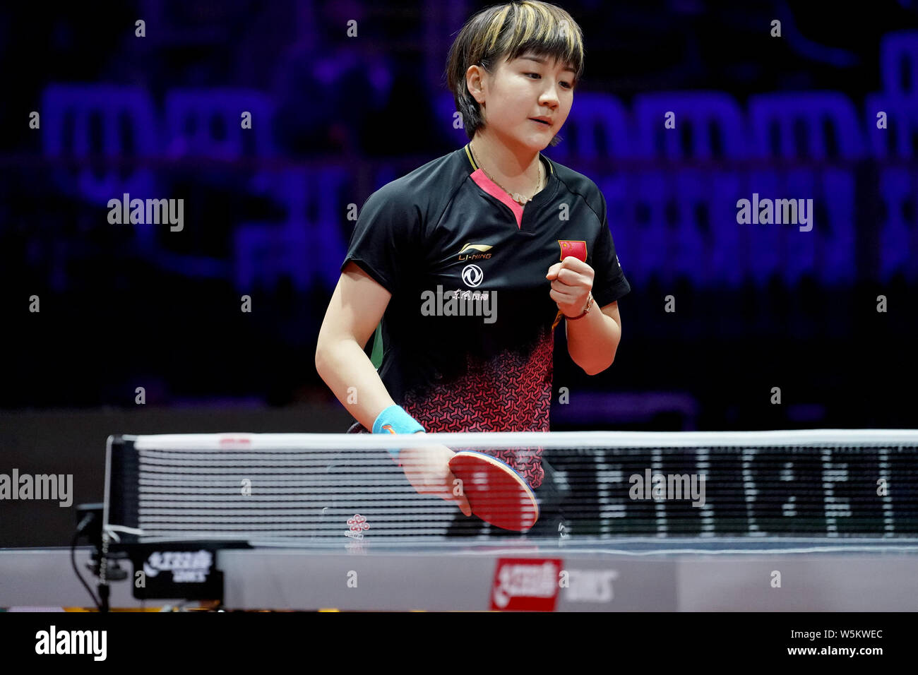 Chen Meng of China celebrates after scoring against Wong Xin Ru of ...