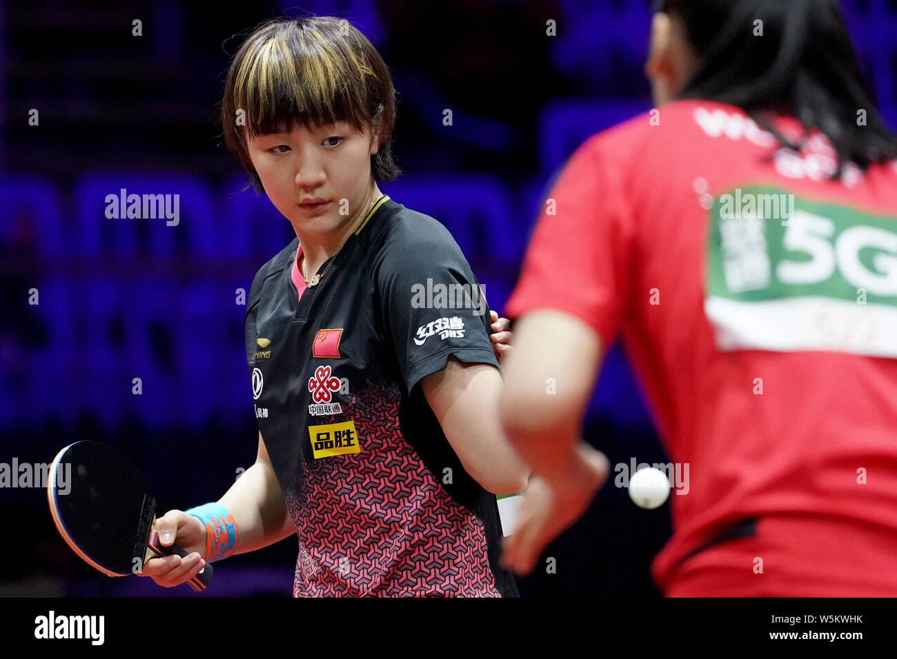 Chen Meng of China serves against Wong Xin Ru of Singapore in their ...