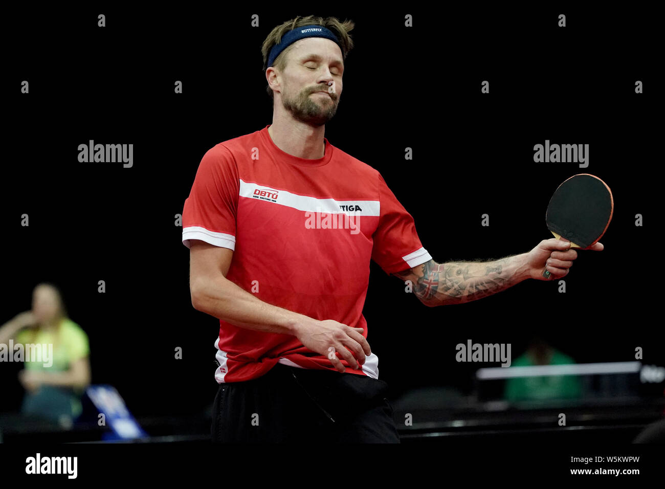 Michael Maze of Denmark reacts as he competes against Aleksandar ...