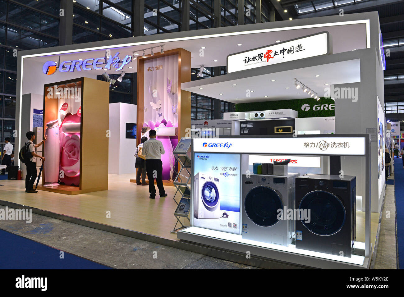 --FILE--People visit the stand of Gree during an expo in Shenzhen city ...