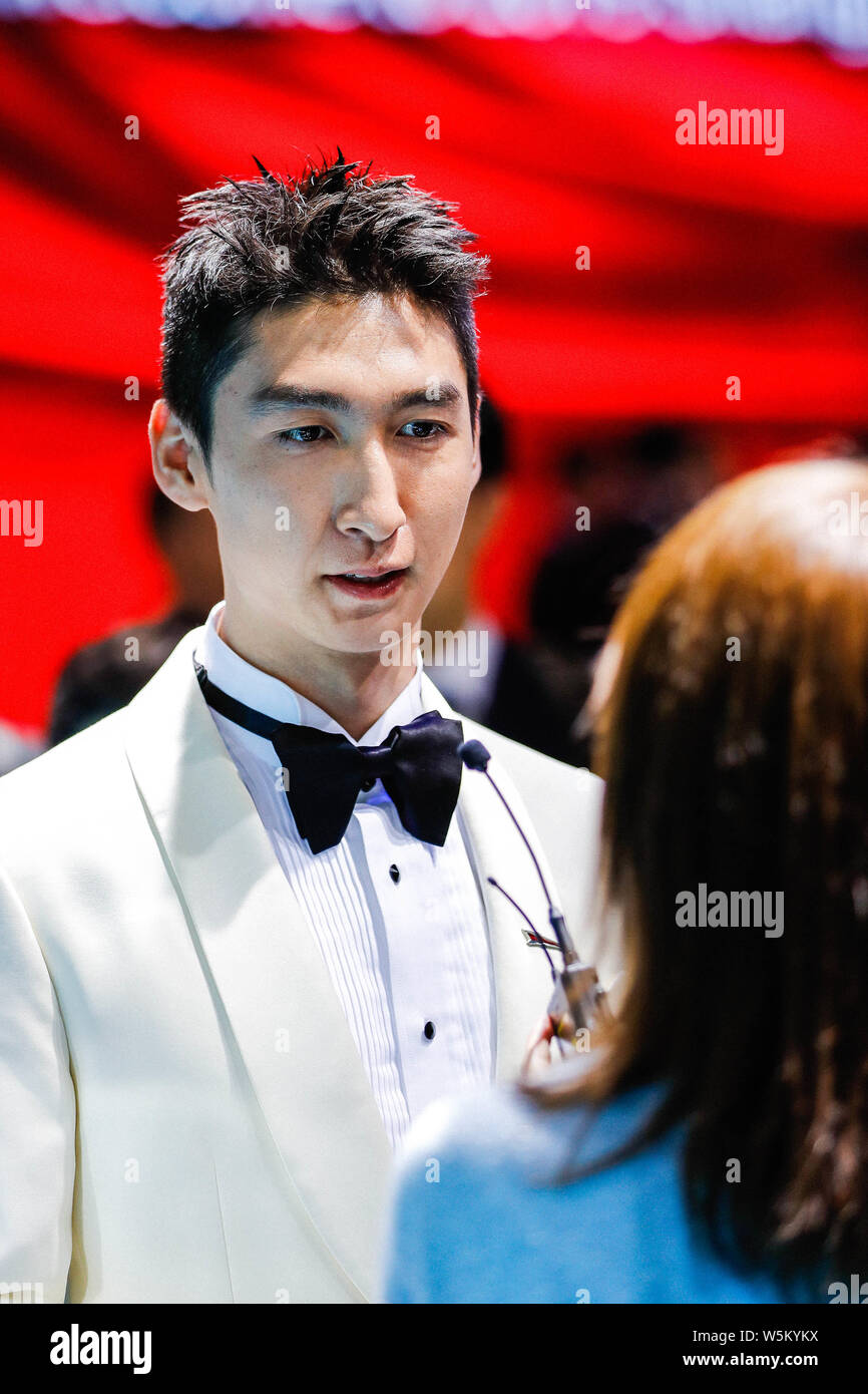 Chinese short track speed skater Wu Dajing, the winner of the men's 500 ...