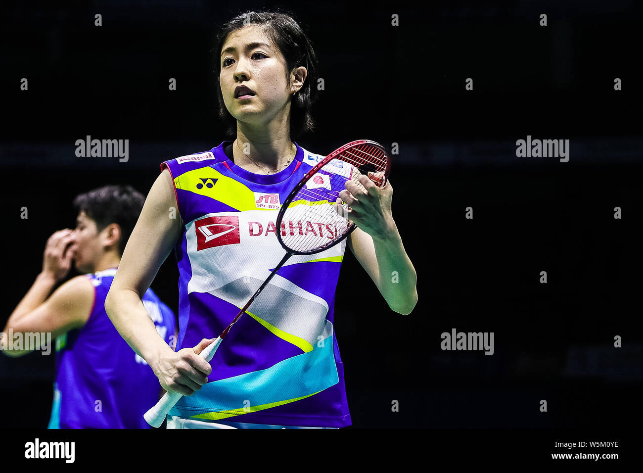 Ayane Kurihara reacts while competing against Sachin Dias and Thilini Pramodika Hendahewa of Sri ...