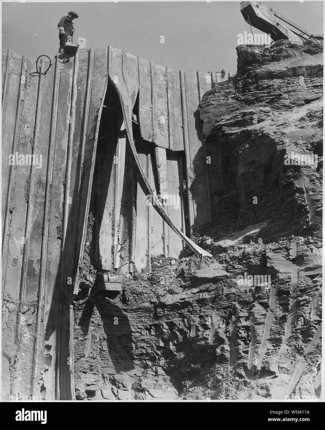 Detail showing action of sheet piling driven in compact clay.; Scope ...