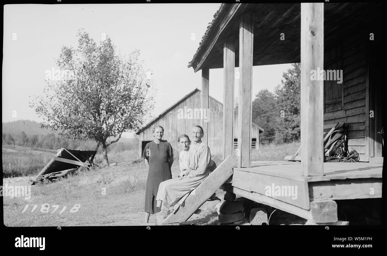 Dickey sisters on front porch Stock Photo - Alamy