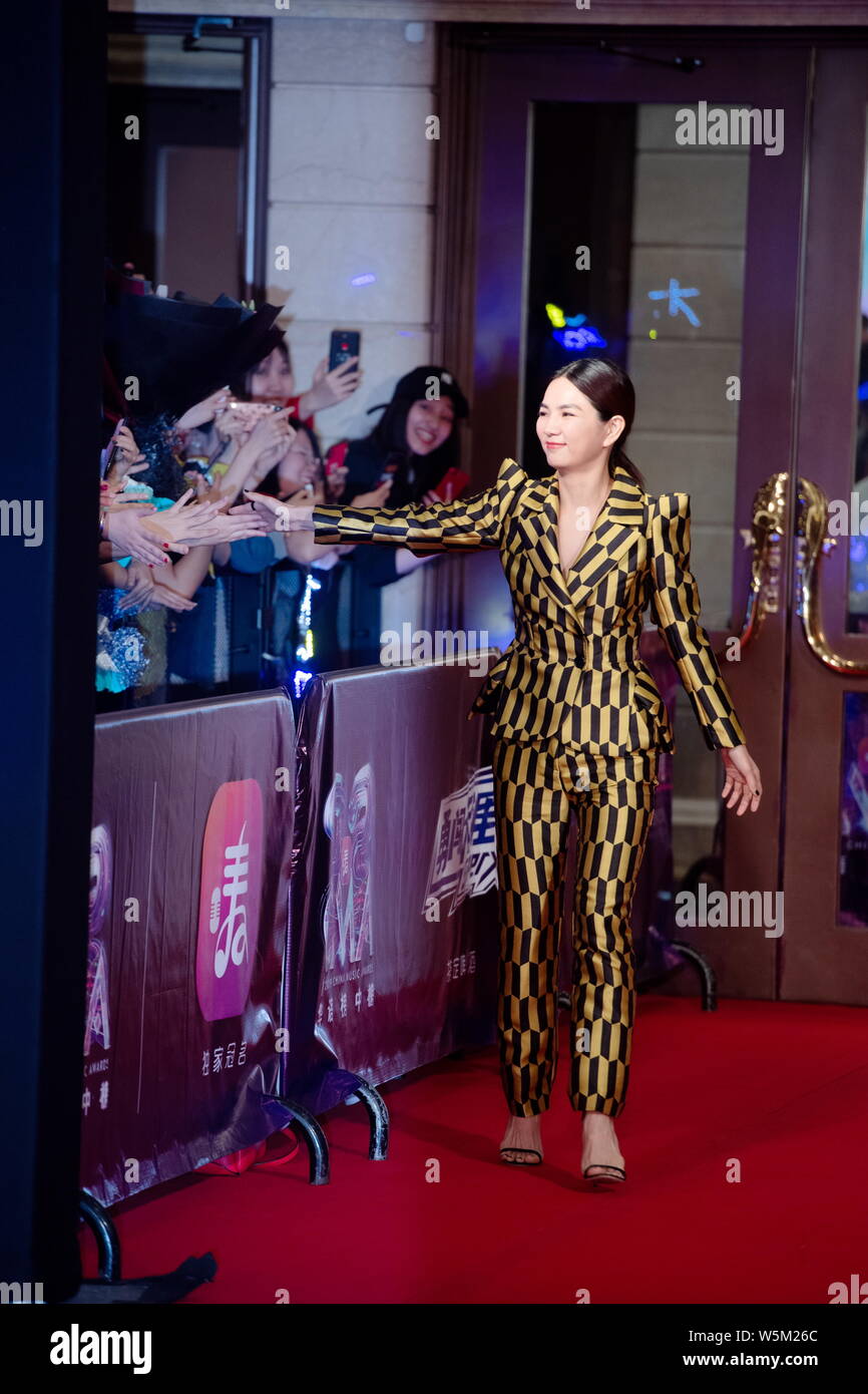 Ella Chen Chia-hwa of Taiwanese girls group S.H.E poses as he arrives ...