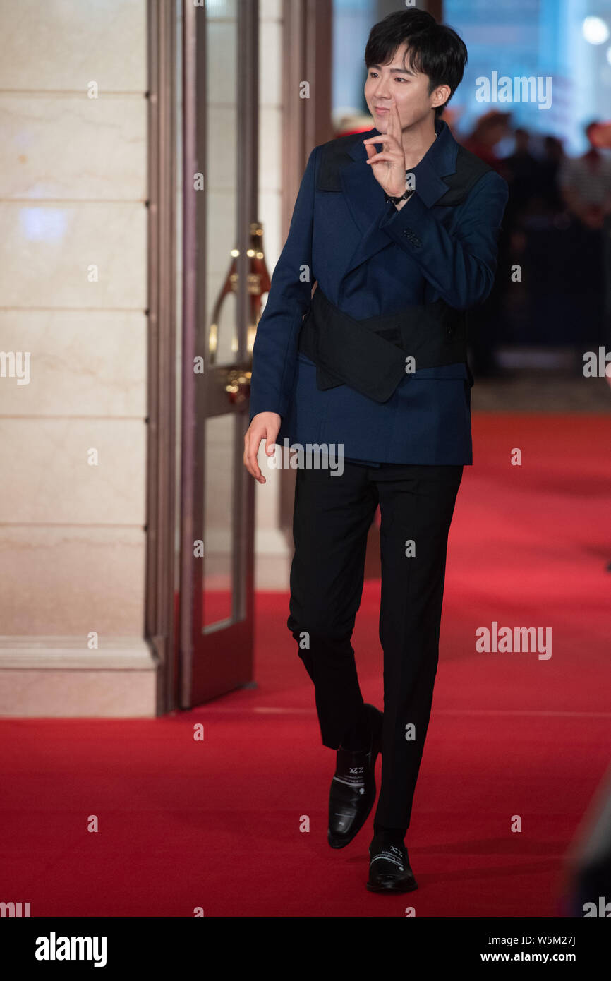 Chinese mainland's pop music male singer and actor Liu Yuning poses as he arrives on the red ...