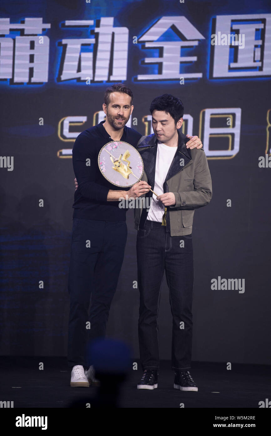 Canadian-American actor Ryan Reynolds, left, and Chinese actor Lei ...