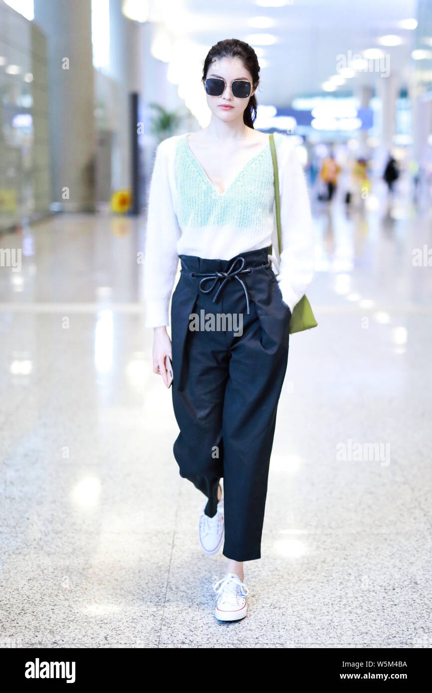 Chinese model He Sui arrives at the Shanghai Hongqiao International ...