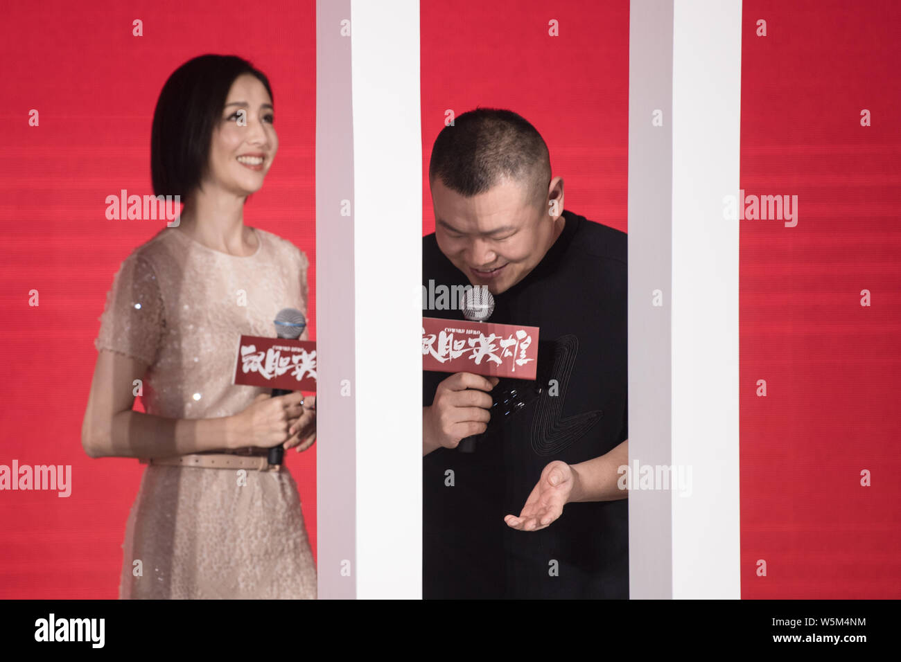Chinese actress Tong Liya and xiangsheng proformer Yue Yunpeng attend a ...