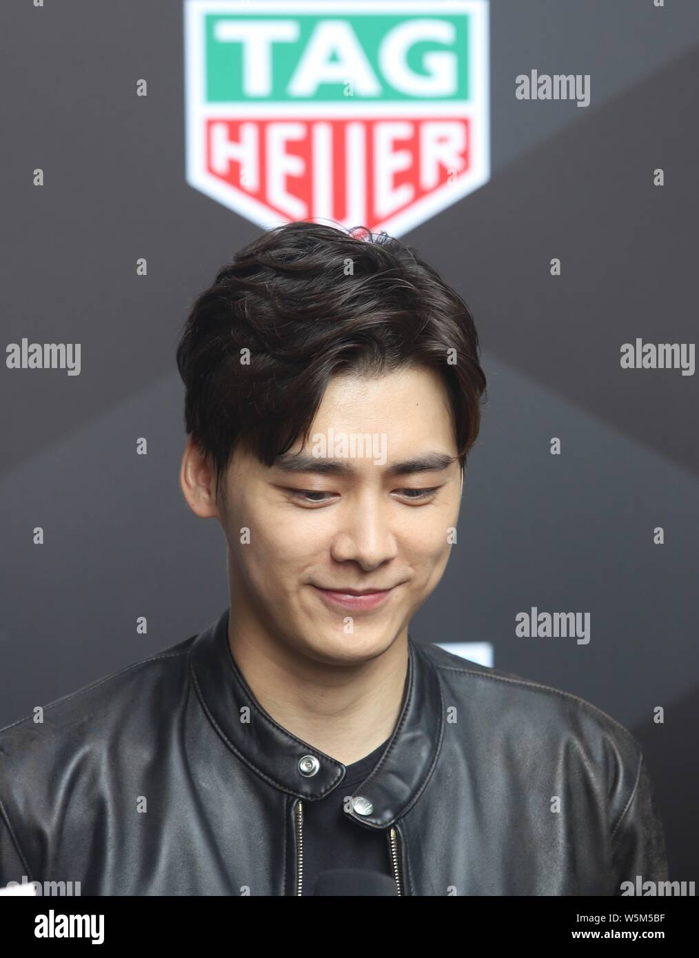 Chinese actor and singer Li Yifeng attends a promotional event for TAG ...
