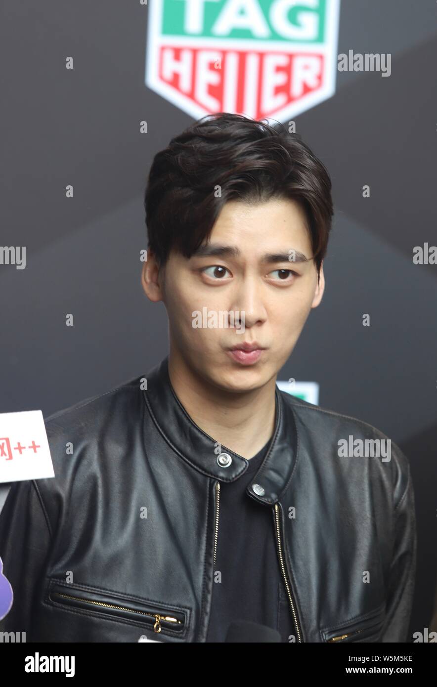 Chinese actor and singer Li Yifeng attends a promotional event for TAG ...