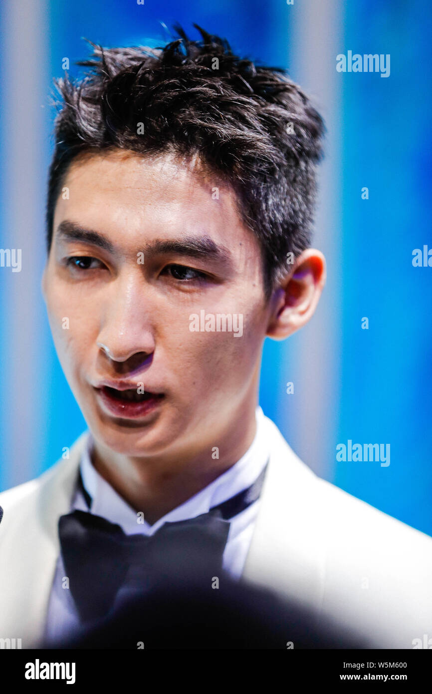 Chinese short track speed skater Wu Dajing, the winner of the men's 500 ...