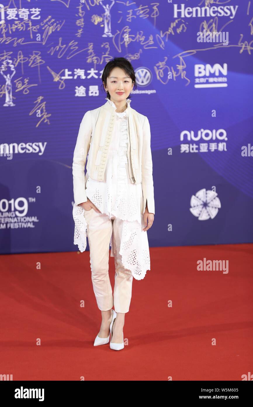 Chinese actress Zhou Dongyu poses as she arrives on the red carpet for ...