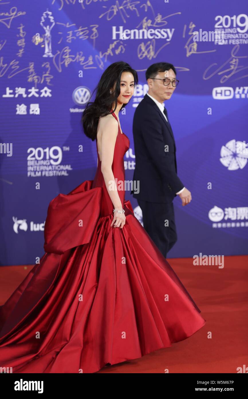 Chinese actress Chen Duling poses as she arrives on the red carpet for the opening ceremony of ...