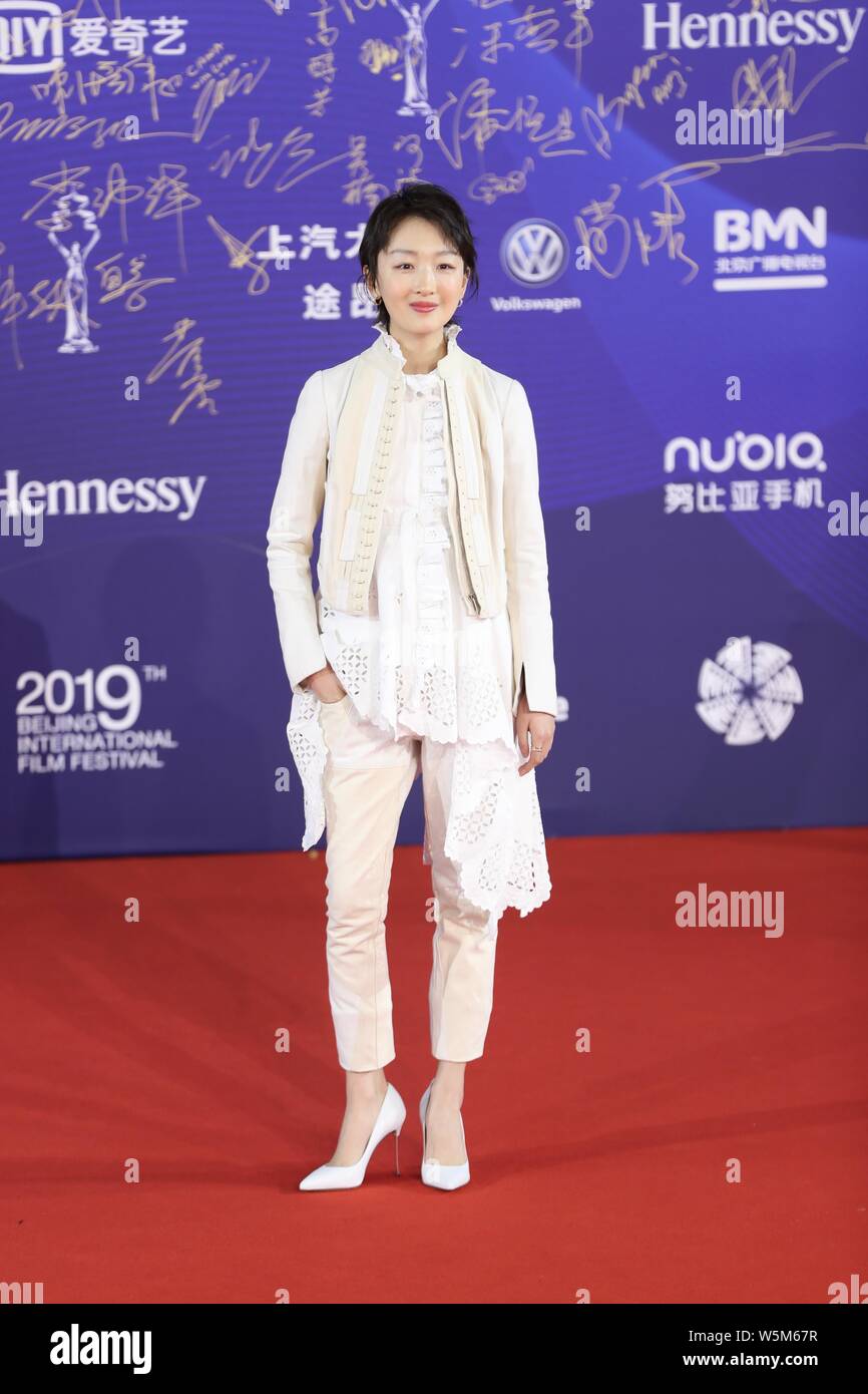 Chinese actress Zhou Dongyu poses as she arrives on the red carpet for ...