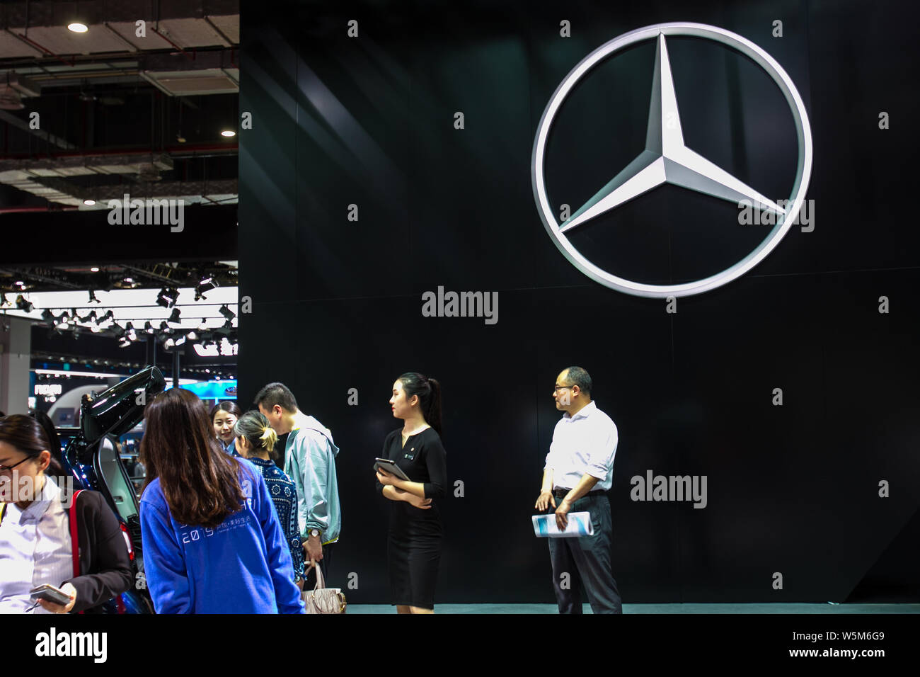 --FILE--People visit the stand of Mercedes-Benz during the 18th ...