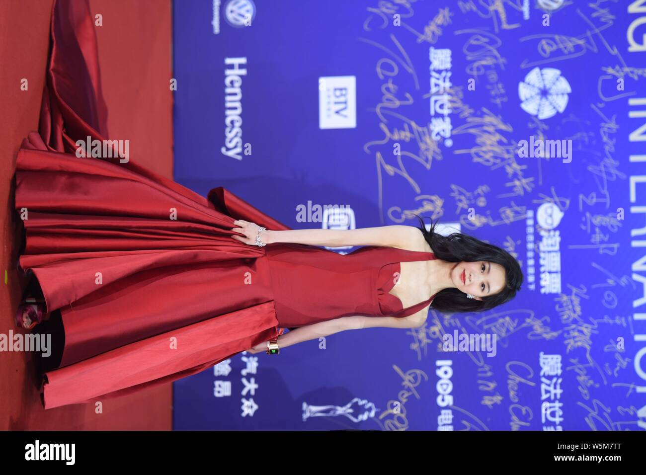 Chinese actress Chen Duling poses as she arrives on the red carpet for the opening ceremony of ...