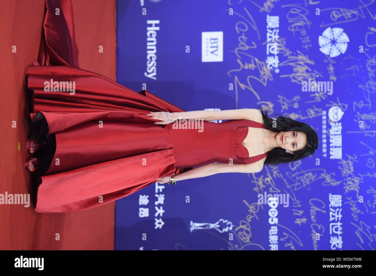 Chinese actress Chen Duling poses as she arrives on the red carpet for the opening ceremony of ...