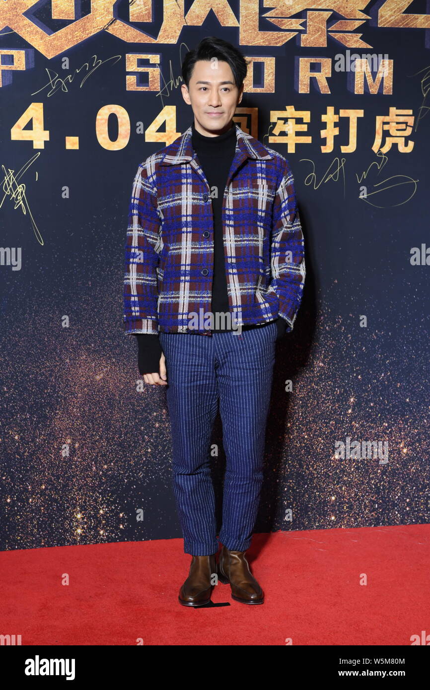 Hong Kong singer and actor Raymond Lam poses as he arrives on the red ...