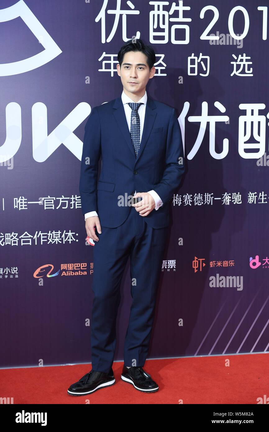 --FILE--Taiwanese actor Vic Chou arrives on the red carpet for the 2018 ...