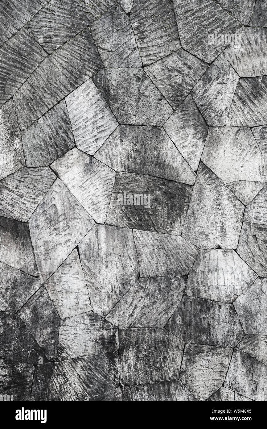 Grey stone wall background, pattern with different geometric shapes ...