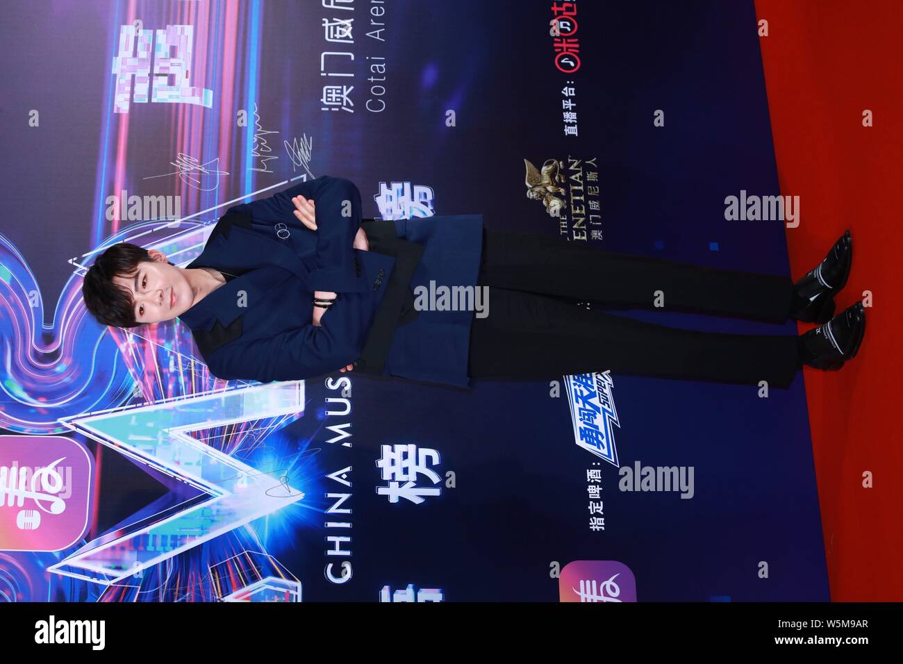 Chinese mainland's pop music male singer and actor Liu Yuning poses as ...