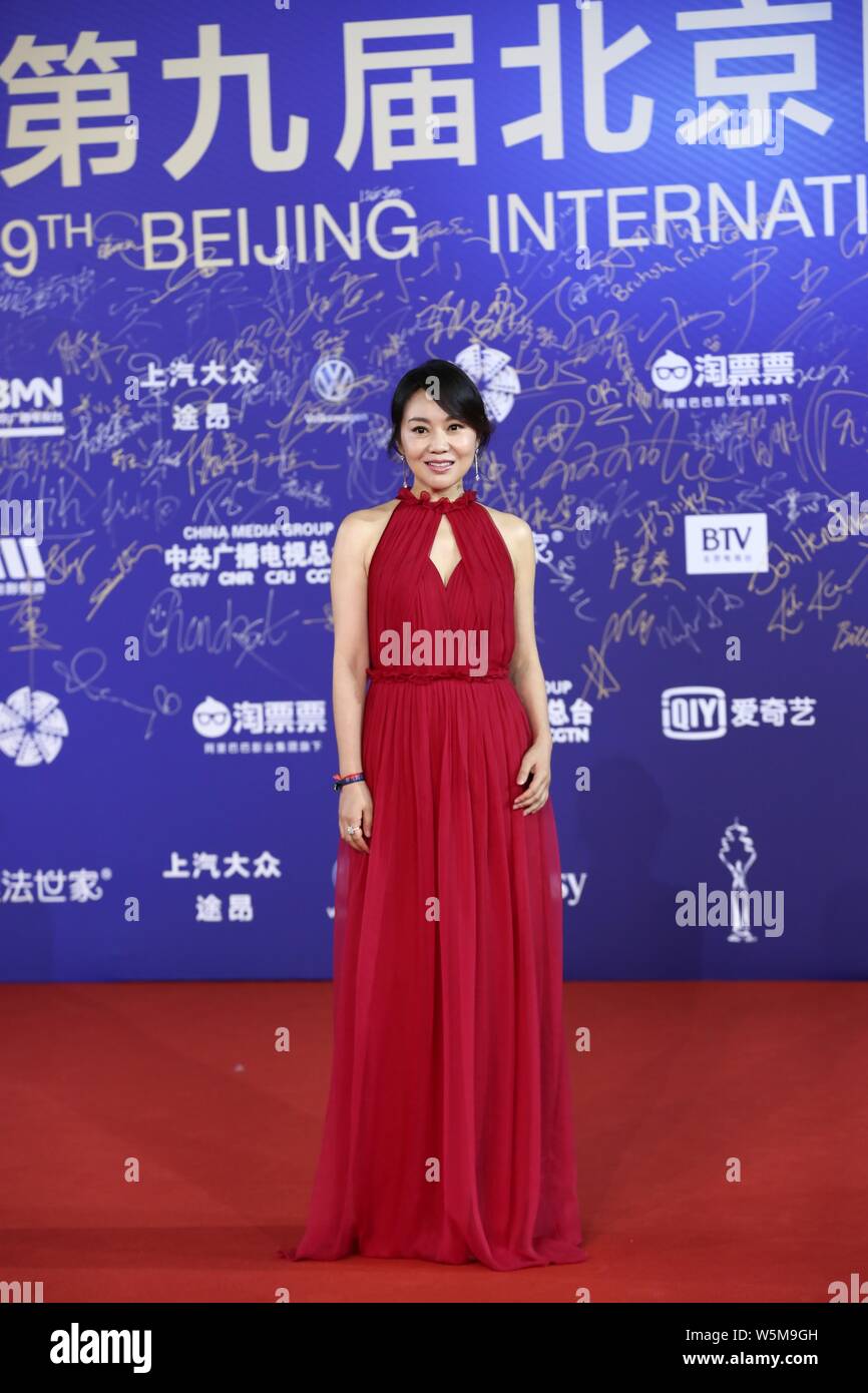 Chinese actress Yan Ni arrives on the red carpet for the closing and ...