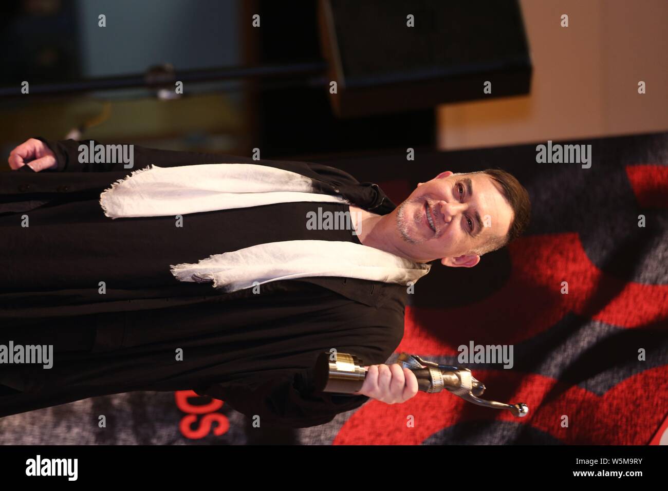 Hong Kong actor Anthony Wong poses with his trophy after winning "Best ...