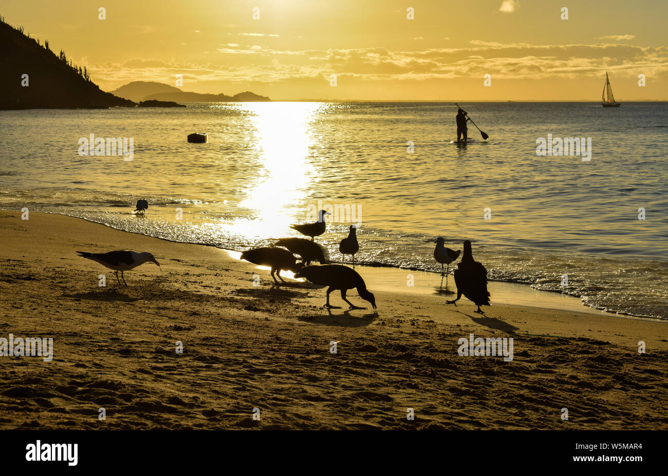 Sunset in Buzios Stock Photo - Alamy