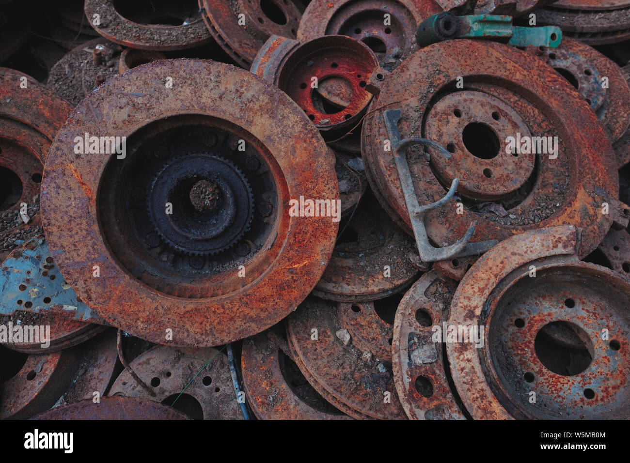 A large pile of rusted, worn brake disks Stock Photo - Alamy