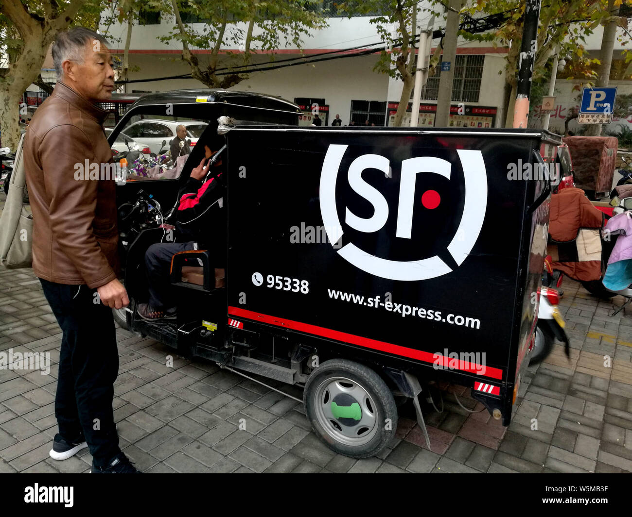 Sf holding hi-res stock photography and images - Alamy