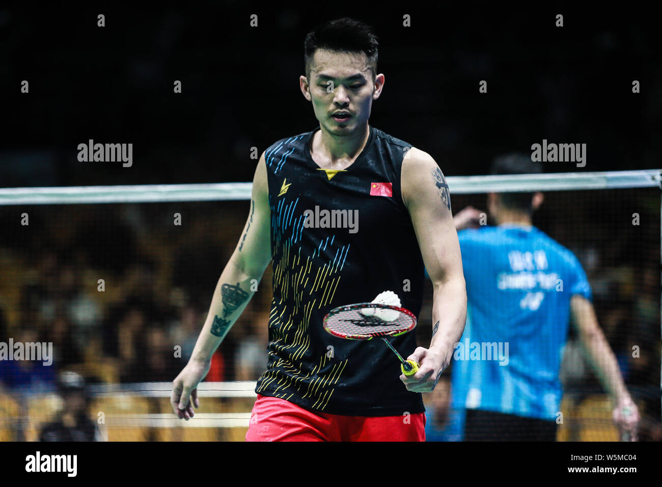 Lin Dan of China reacts while competing against Lu Chia-hung of Chinese ...